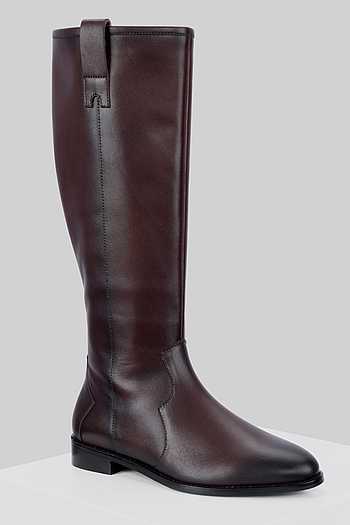 Buy Brown Plain Asturias Long Leather Boots by OROH Online at Aza Fashions.