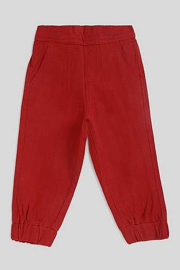 Buy Red Cotton Plain Joggers For Girls by Charkhee Online at Aza Fashions.