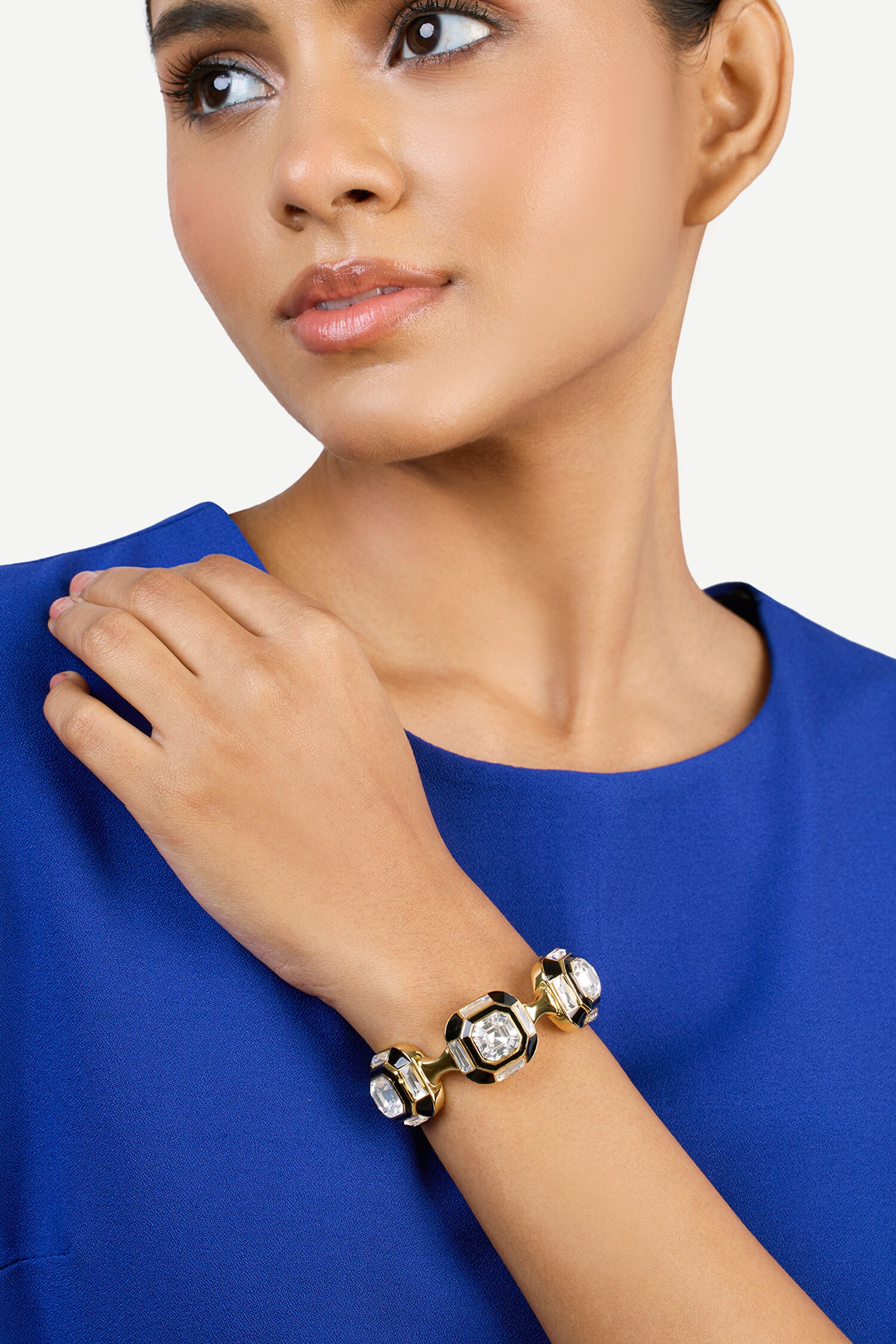 Buy Gold Plated Crystal Moss Deco Cuff by Isharya Online at Aza Fashions.