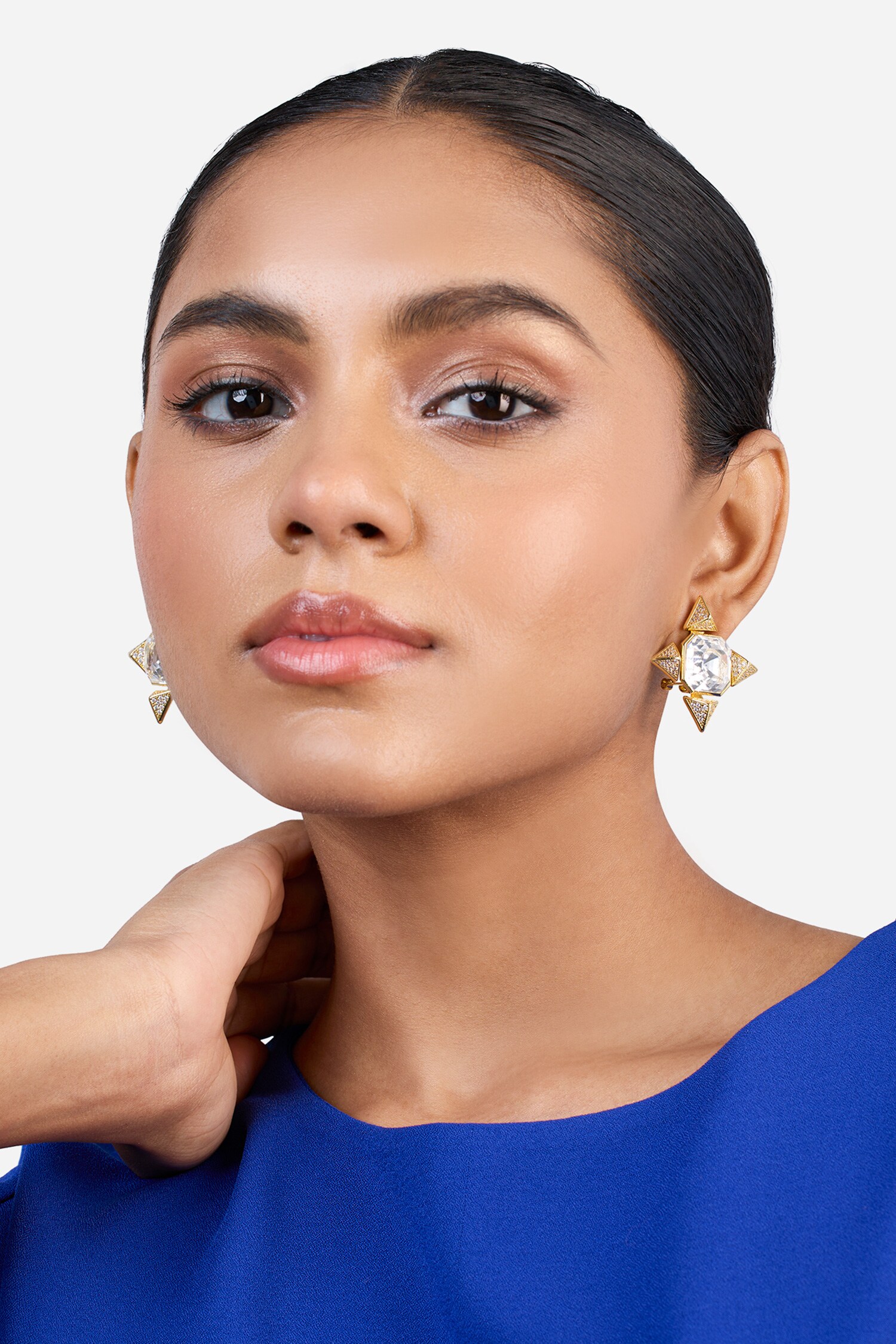 Buy Gold Plated Cubic Zirconia Helix Chrome Star Studs by Isharya Online at Aza Fashions.