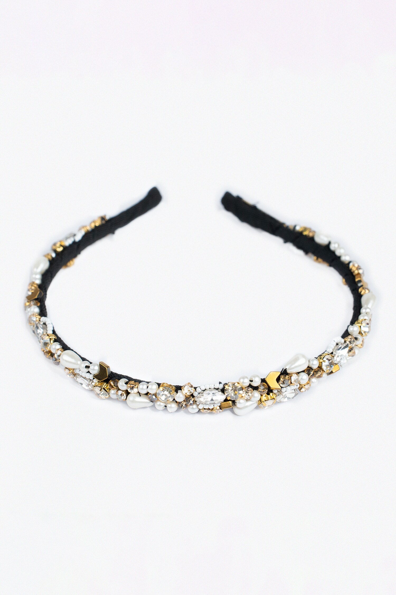 Buy White Embellished Queen Pearl Hair Band by Born Flash Online at Aza Fashions.