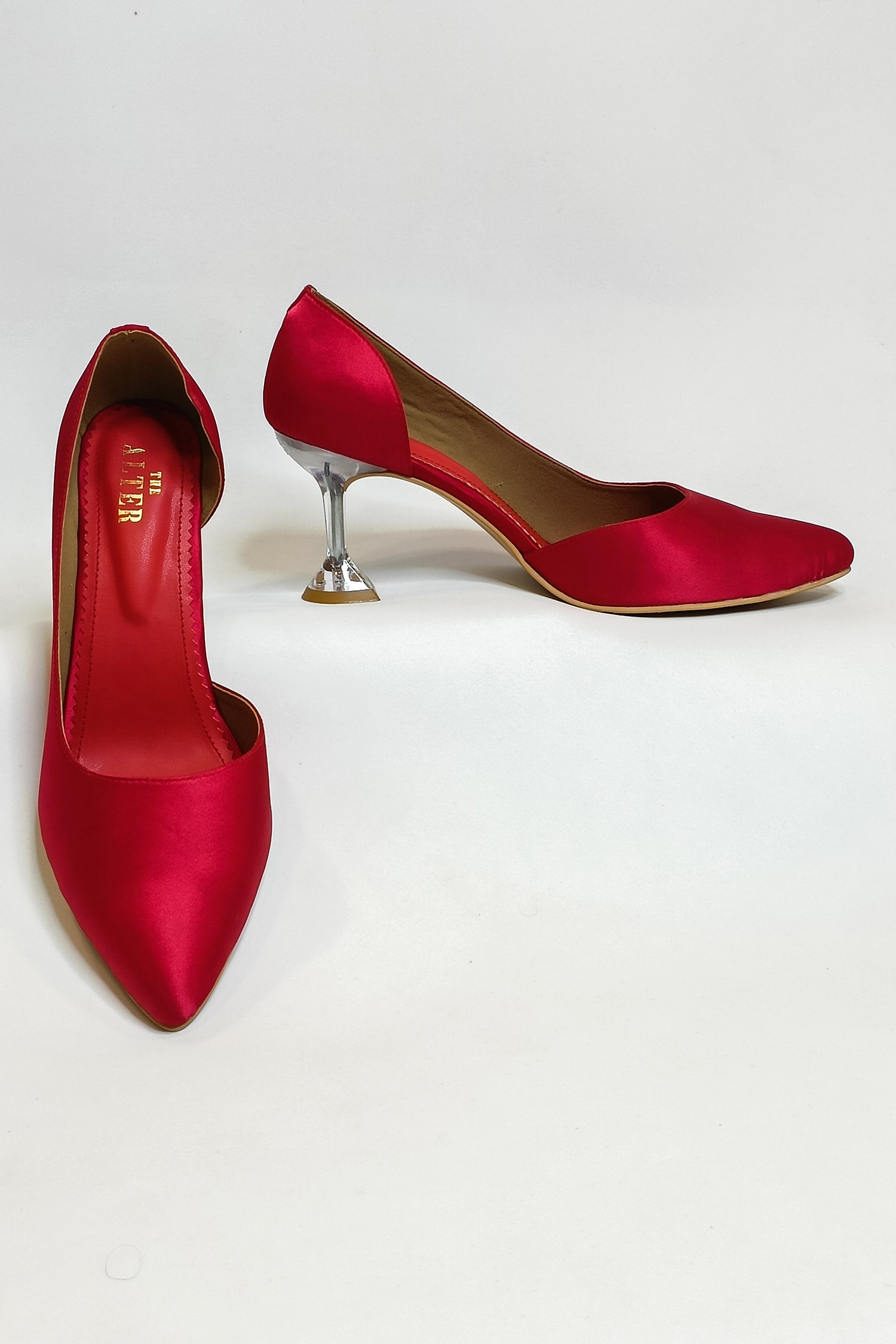 Buy Red Rebecca Satin Pyramid Heels by THE ALTER Online at Aza Fashions.