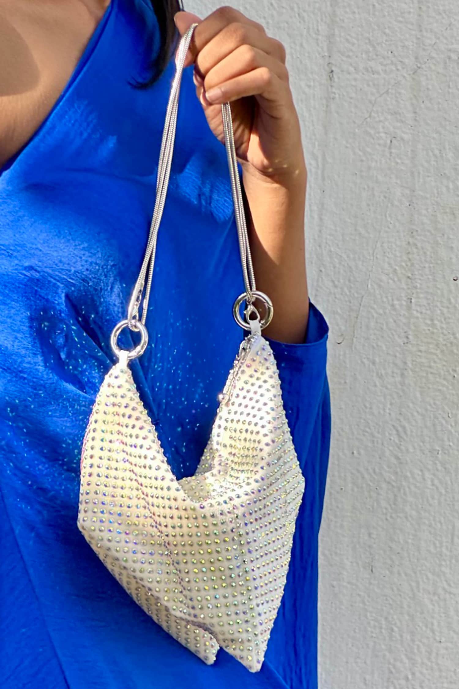 Buy White Crystal Sasha Studded Bling Bag by Ozel Online at Aza Fashions.