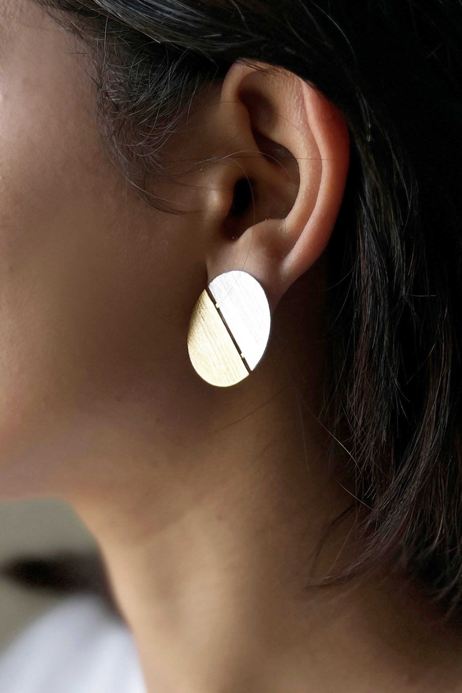 Buy Gold Plated Circular Yin Yang Studs by De'anma Online at Aza Fashions.