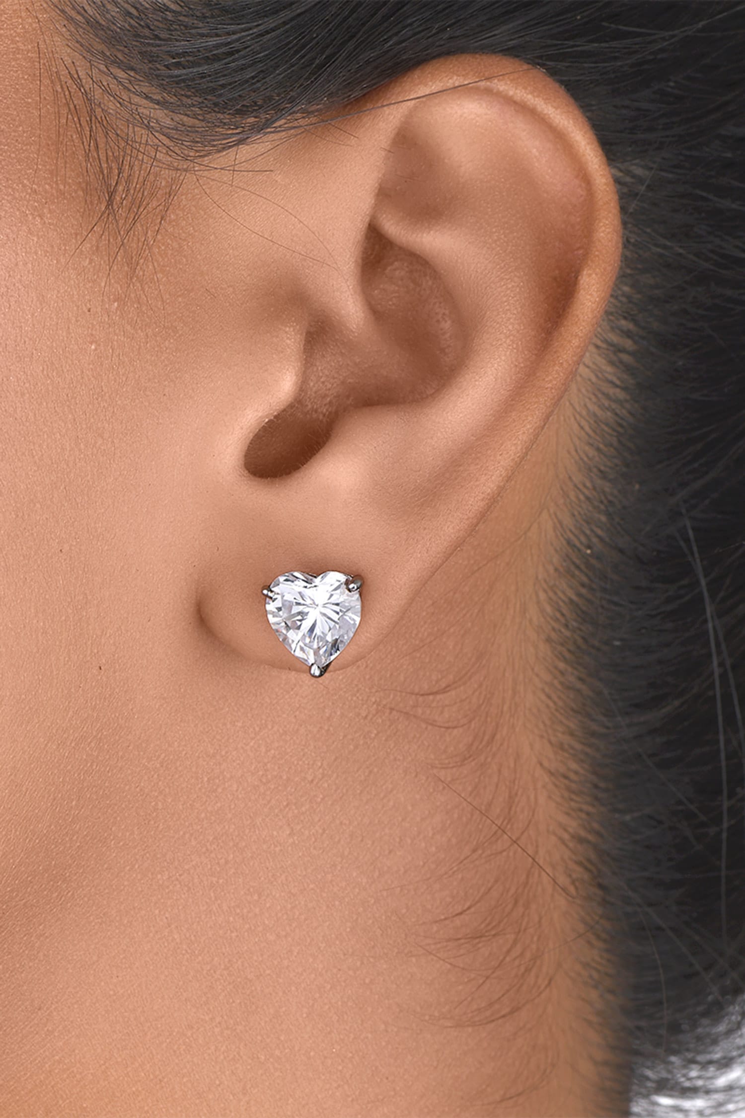 Buy White Swarovski Zirconia Heart Shaped Studs by DIOSA PARIS ...