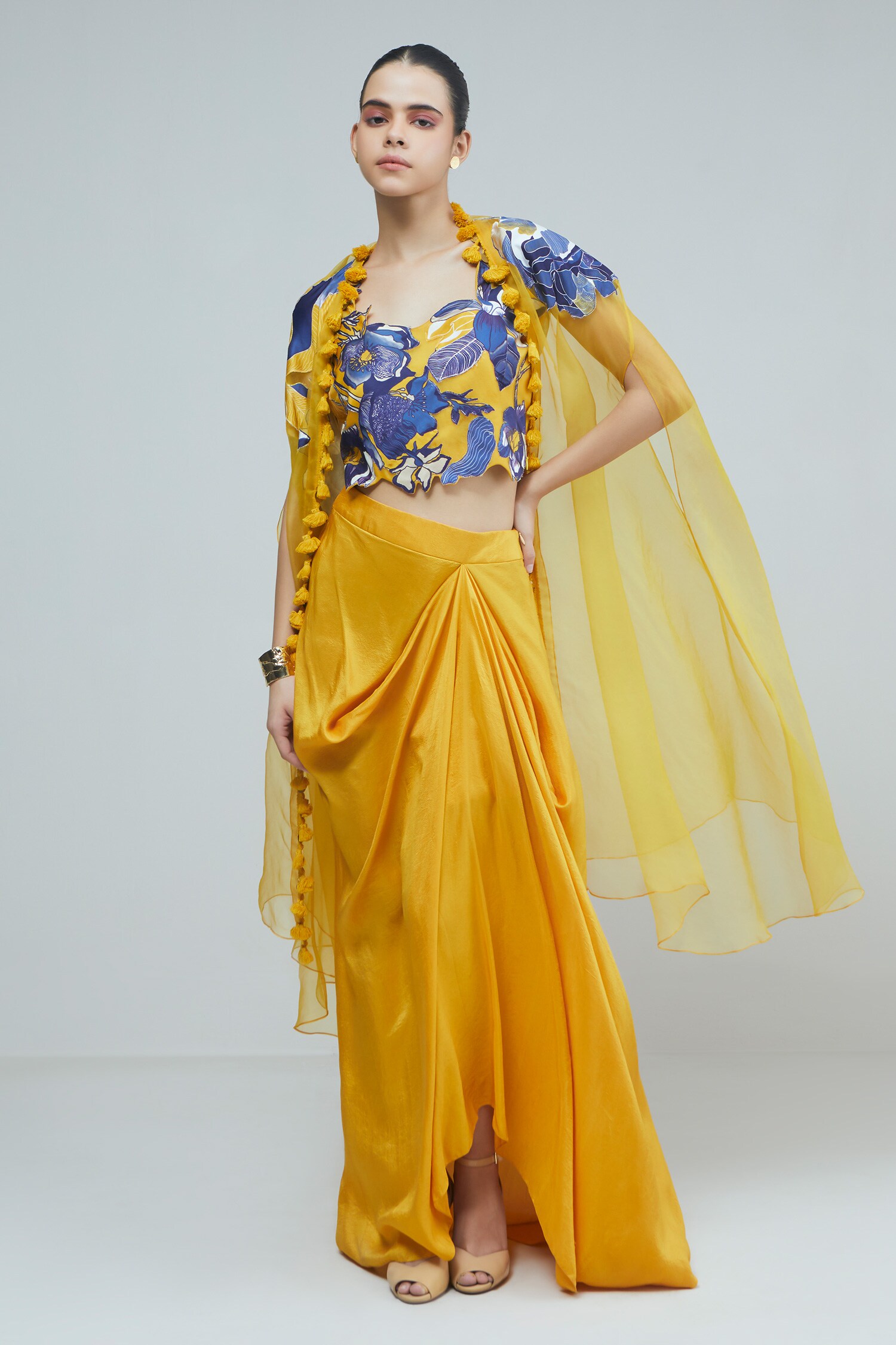 Buy Yellow Cape Organza Applique Bluebell Bloom Draped Skirt Set For Women by Studio Radical ...