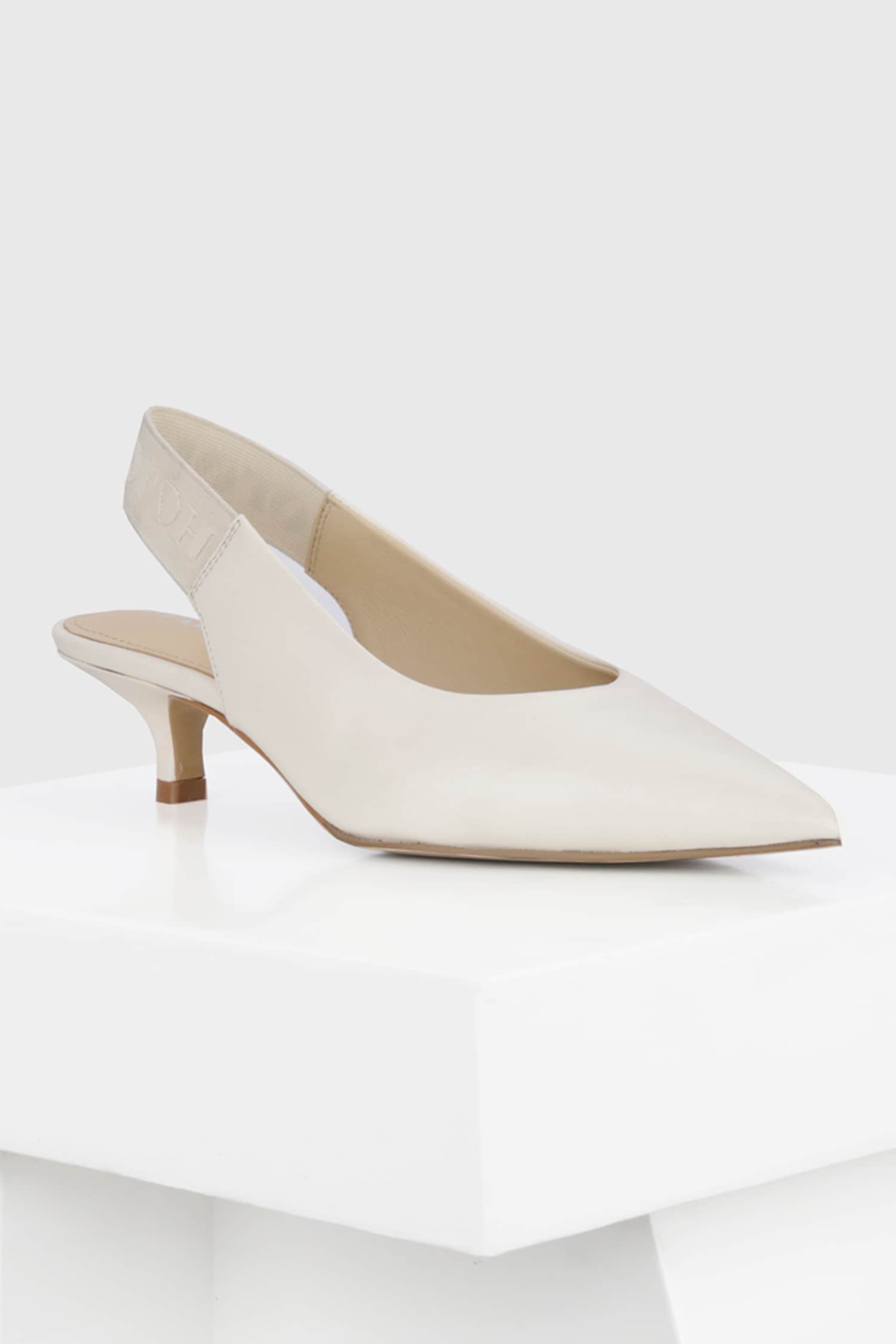Buy White Solid Modena Pointed Toe Kitten Pump Heels by OROH Online at ...