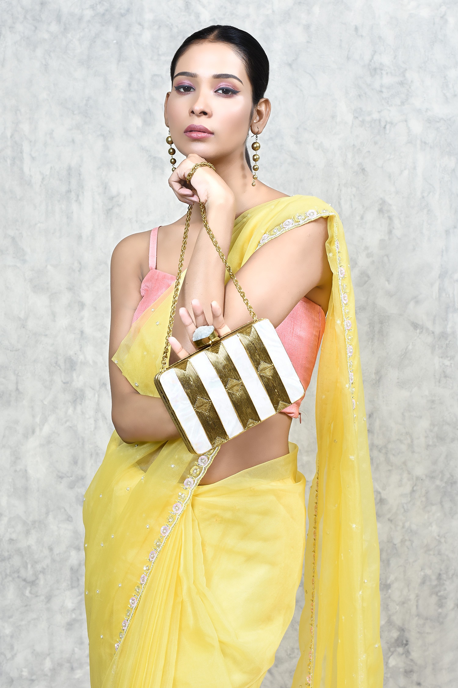 Buy Gold Mother Of Pearl Riwayat Embellished Clutch by THE TAN CLAN Online at Aza Fashions.