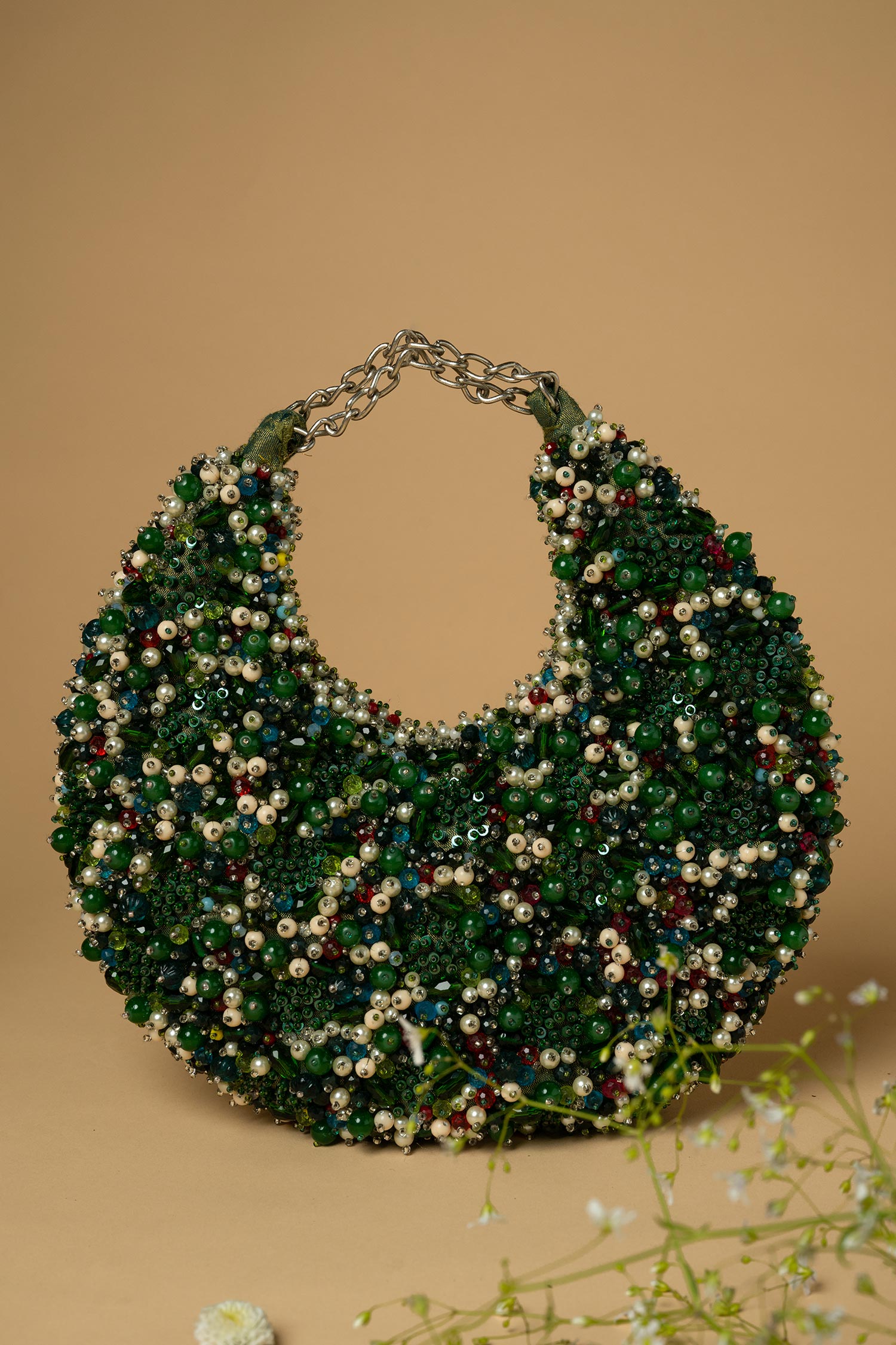 Buy Green Shells Embellished Bag by Clutch'D Online at Aza Fashions.