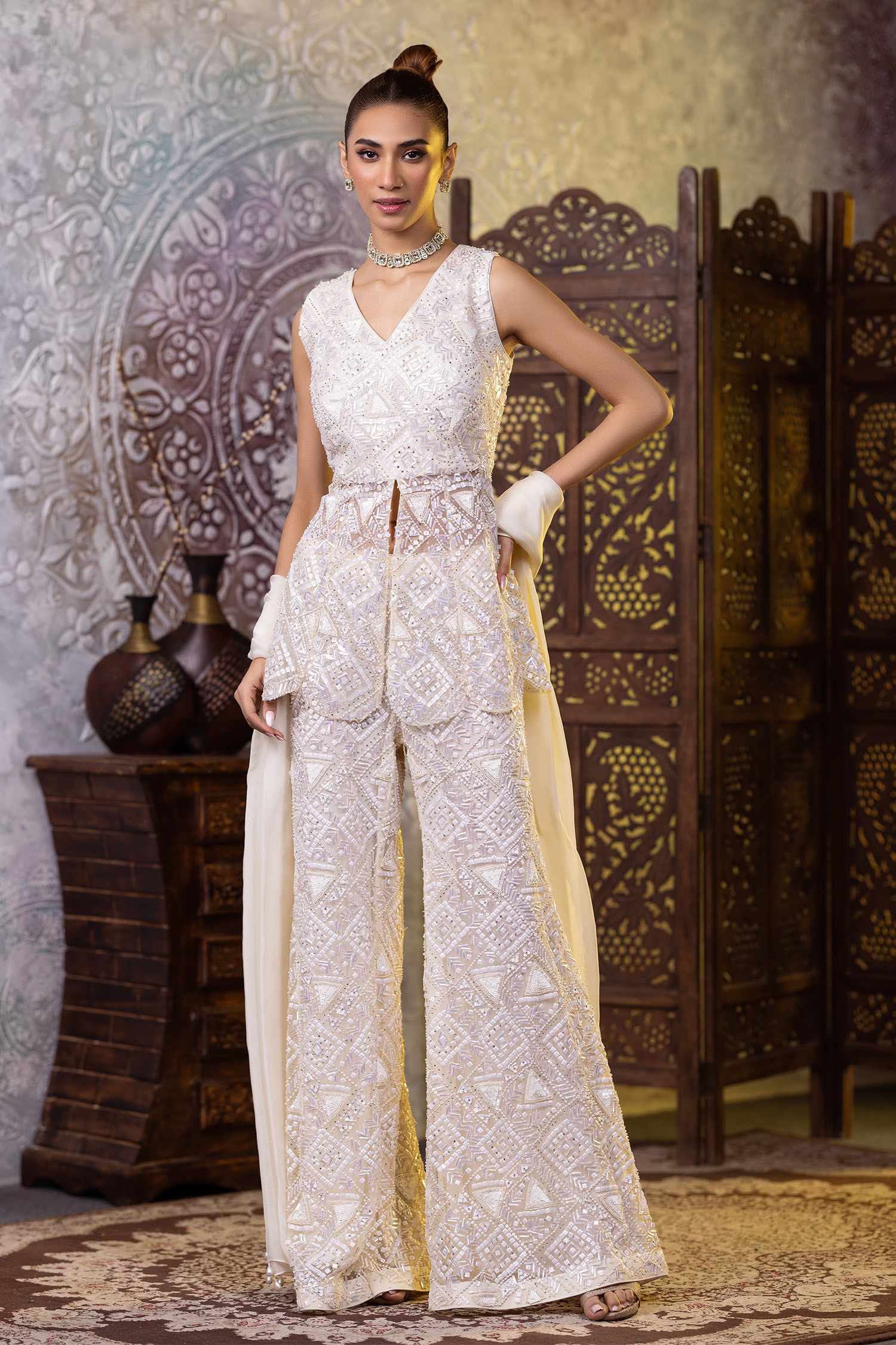 Buy Ivory Net Embroidered Sequins V Neck Peplum Top Bell Bottom Pant ...