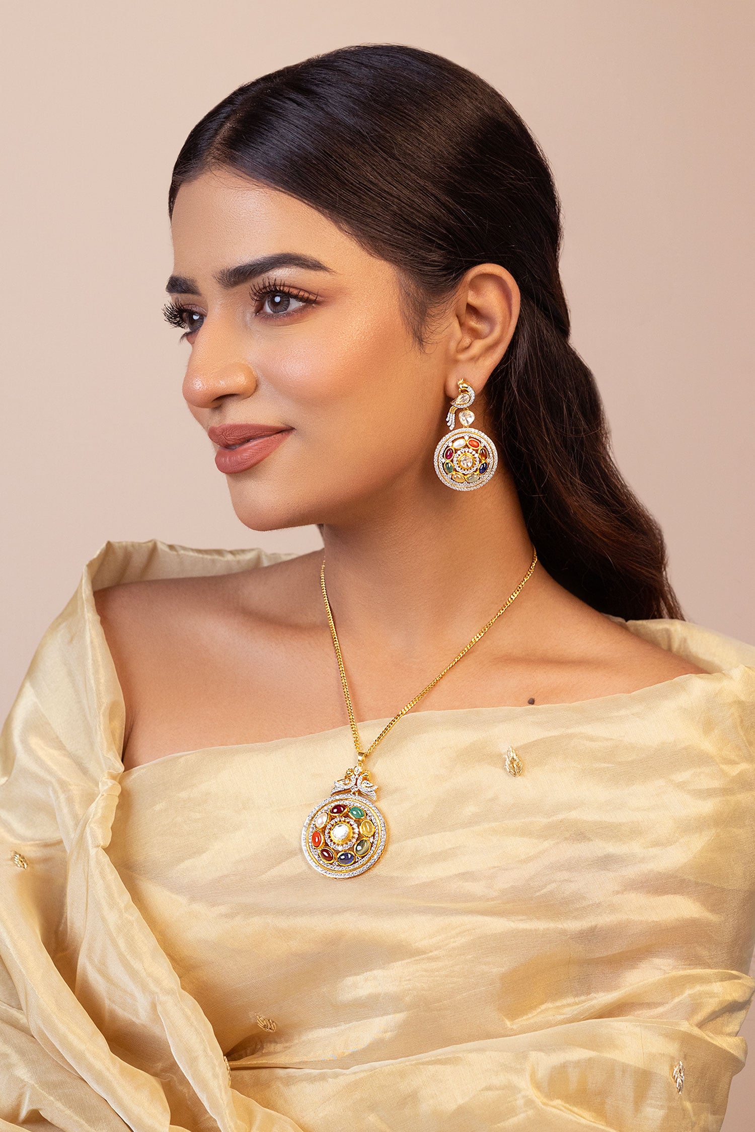 Buy Gold Plated Navratna Amira Stone Embellished Pendant Necklace by ...