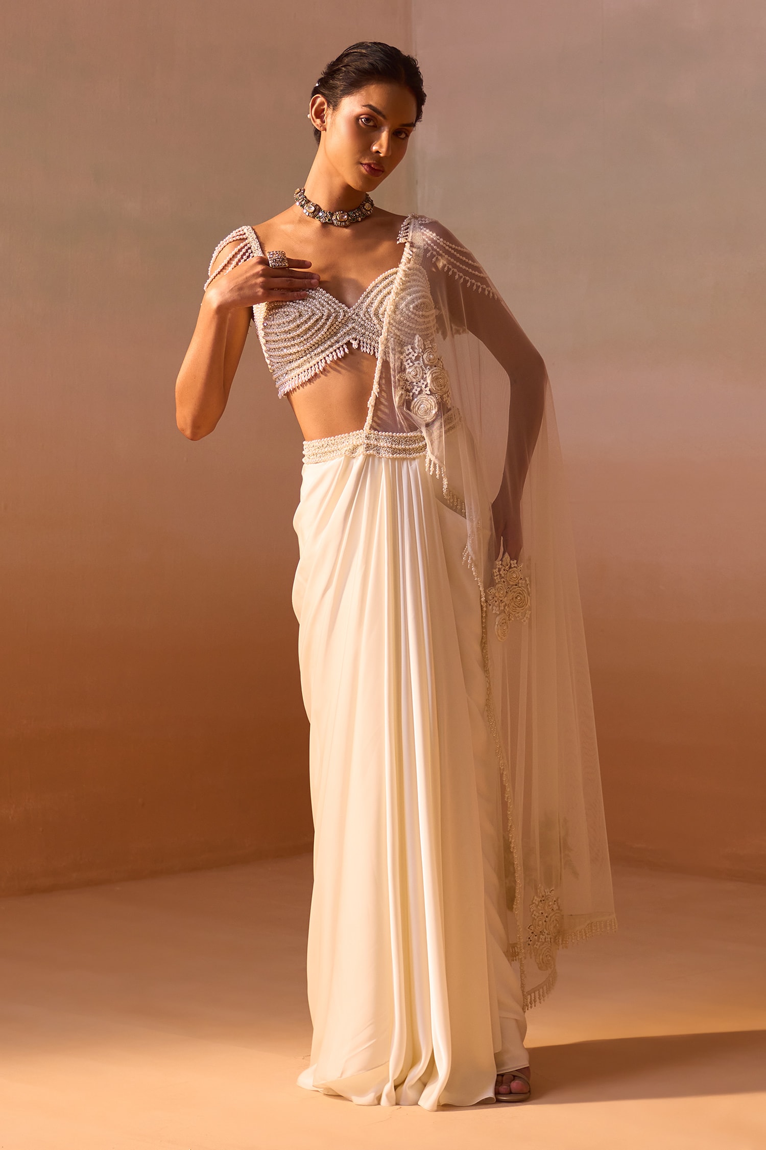 Buy Ivory Net Embroidery Pearl Sweetheart Rosette Pre-draped Saree With ...