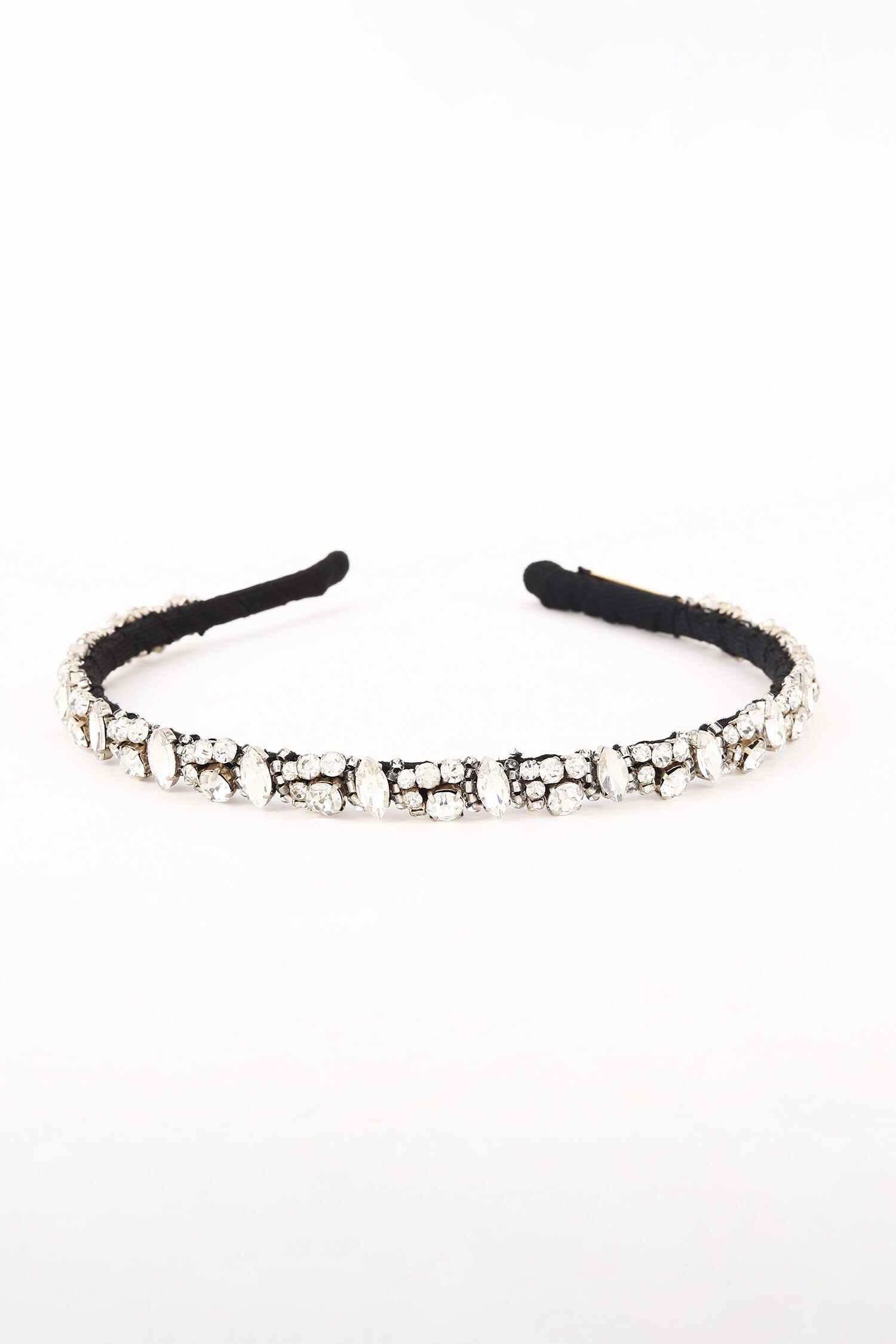 Buy Silver Crystal Shimmer Studded Hairband by Born Flash Online at Aza Fashions.