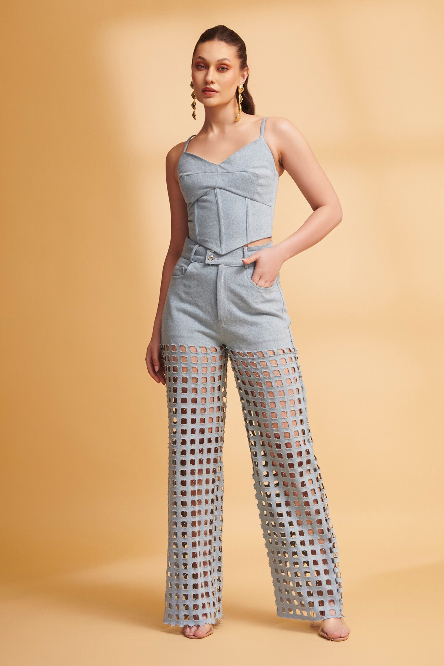 Buy Blue Denim Cutwork Jeans For Women by TORQADORN Online at Aza Fashions.