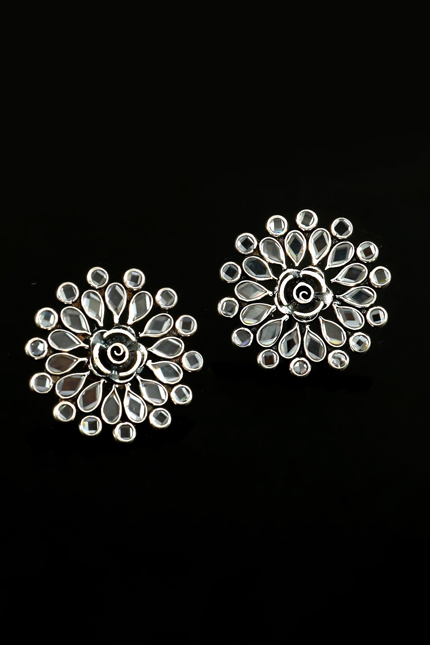 Buy Silver Plated Stone Embellished Floret Studs by Noor Online at Aza Fashions.