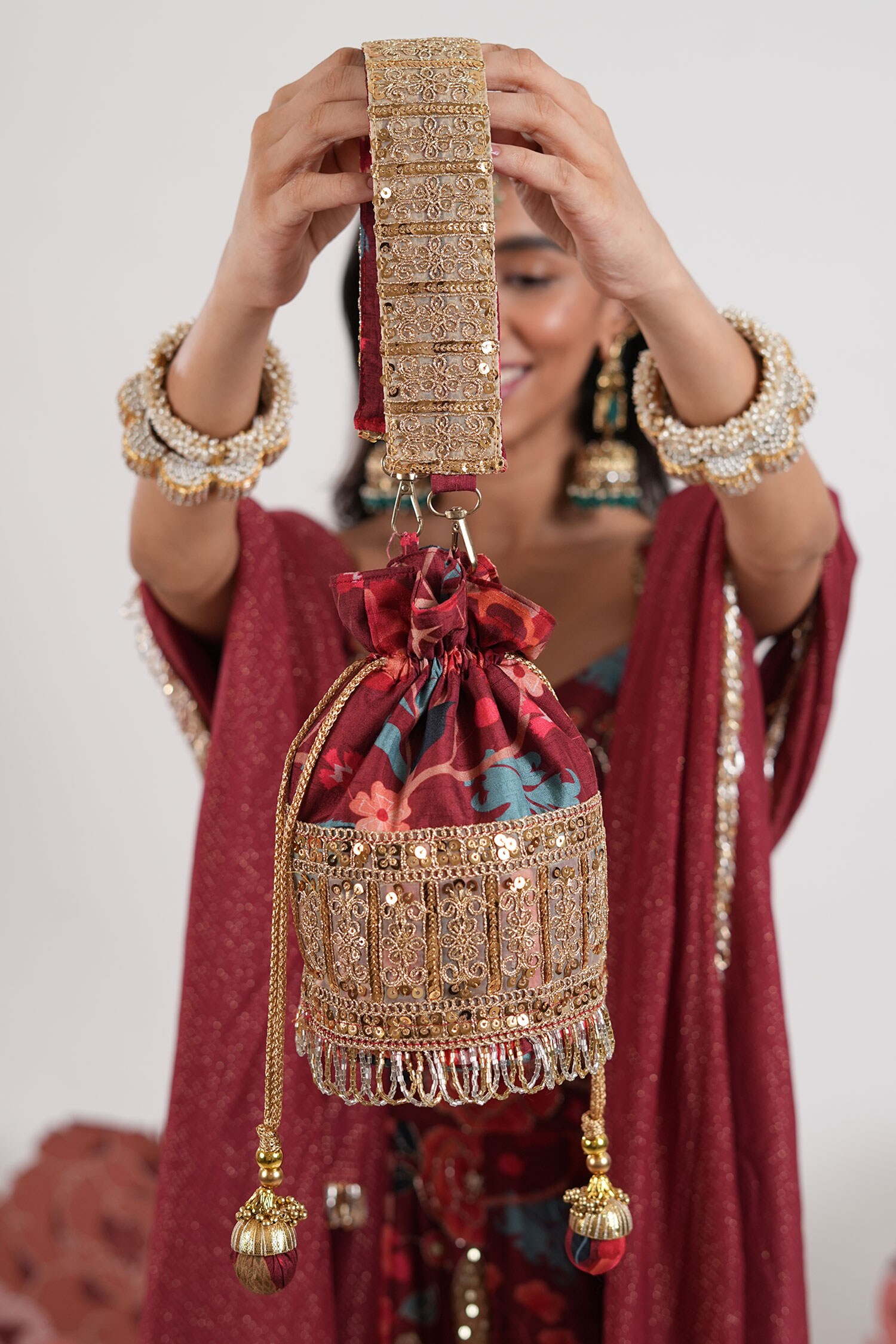 Buy Red Printed Gulabo Floral Sequin Embellished Potli by MANSI GAJJAR ...