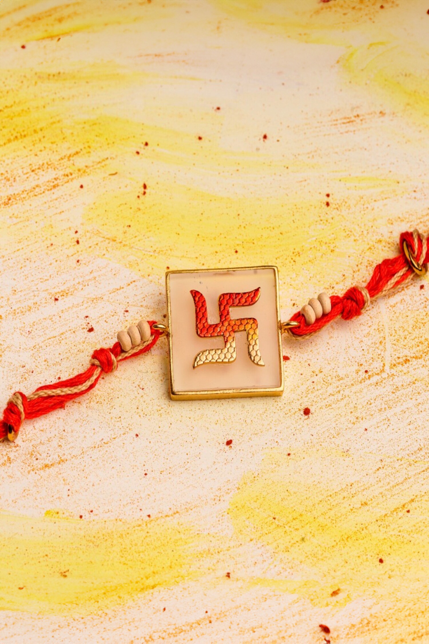 Buy Gold Swastika Hand Painted Acrylic Rakhi by SUHANI PITTIE Online at ...
