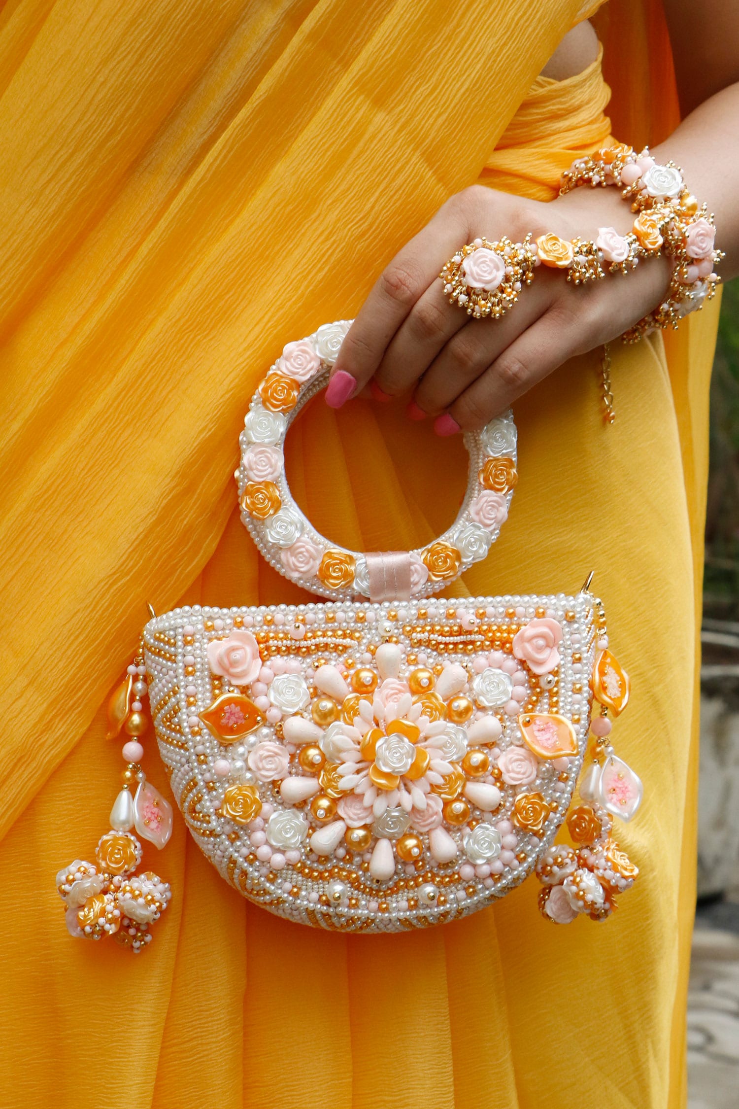 Buy Multi Color Pearl Nivasini Bead Embellished Bag by Vaidaan Online ...