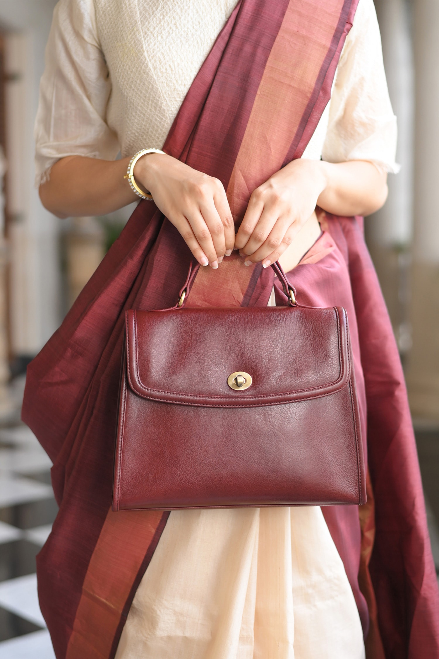 Buy Maroon Plain City Satchel Bag by Tan & Loom Online at Aza Fashions.