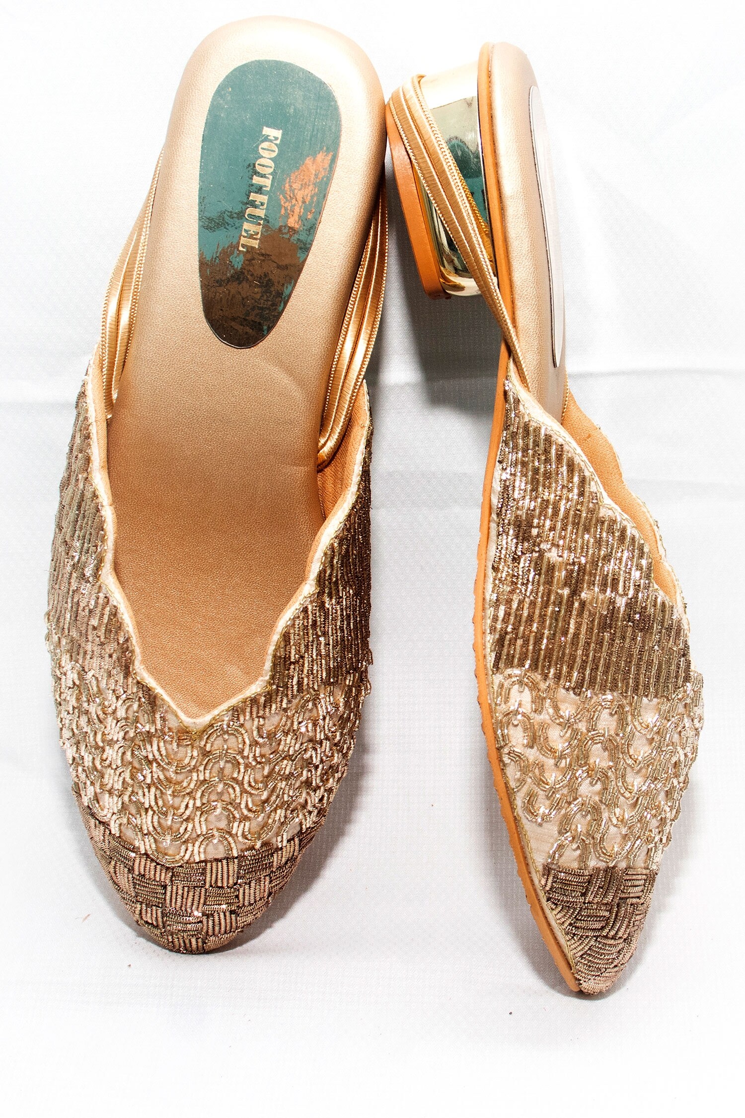 Buy Cream Embroidered Elodie Mules by Foot Fuel Online at Aza Fashions.