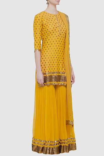 Buy Yellow brocade kurta set by Heli Shah at Aza Fashions