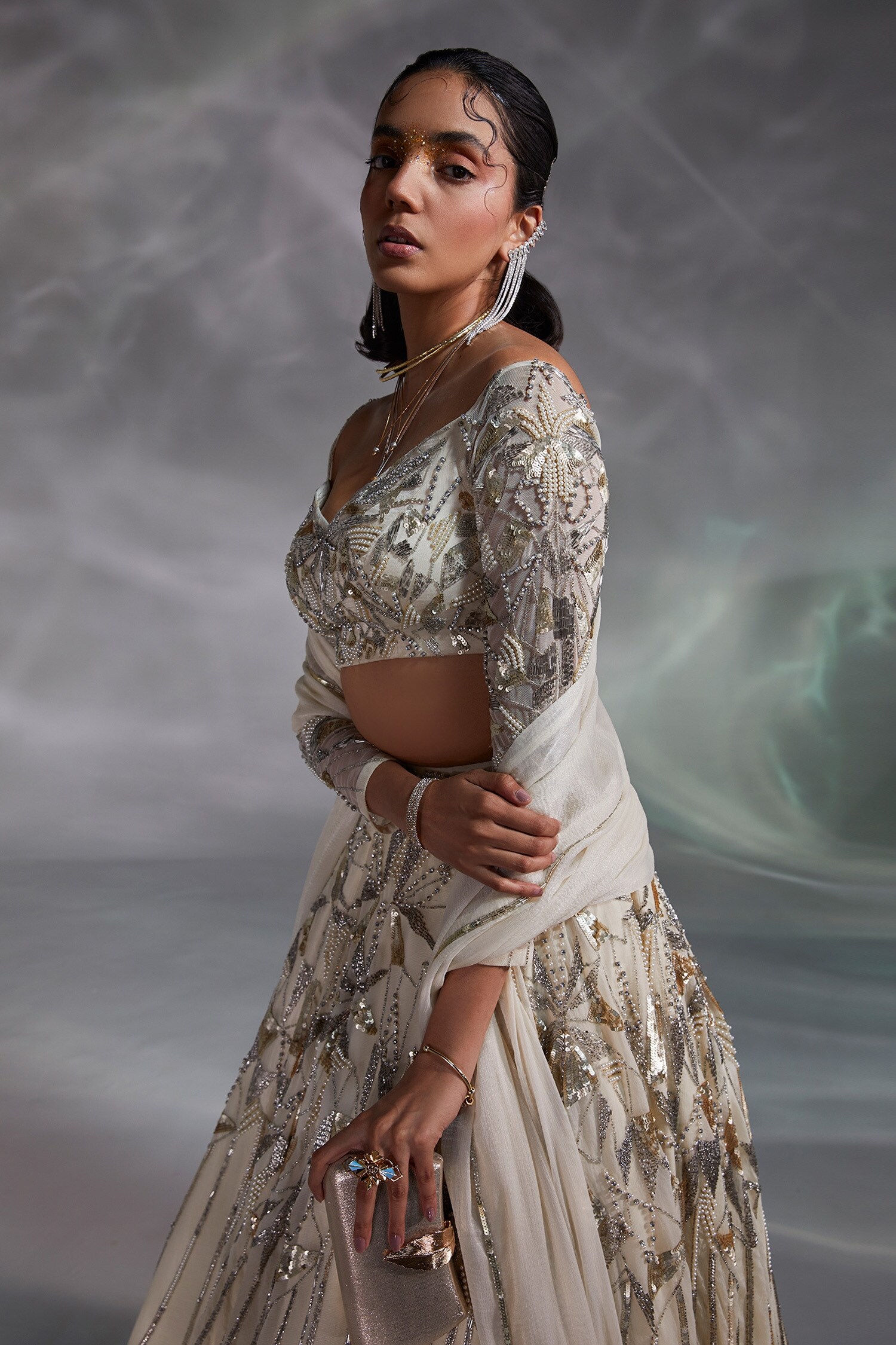 Buy Divya Aggarwal Off White Crushed Organza Belen Embellished Lehenga ...