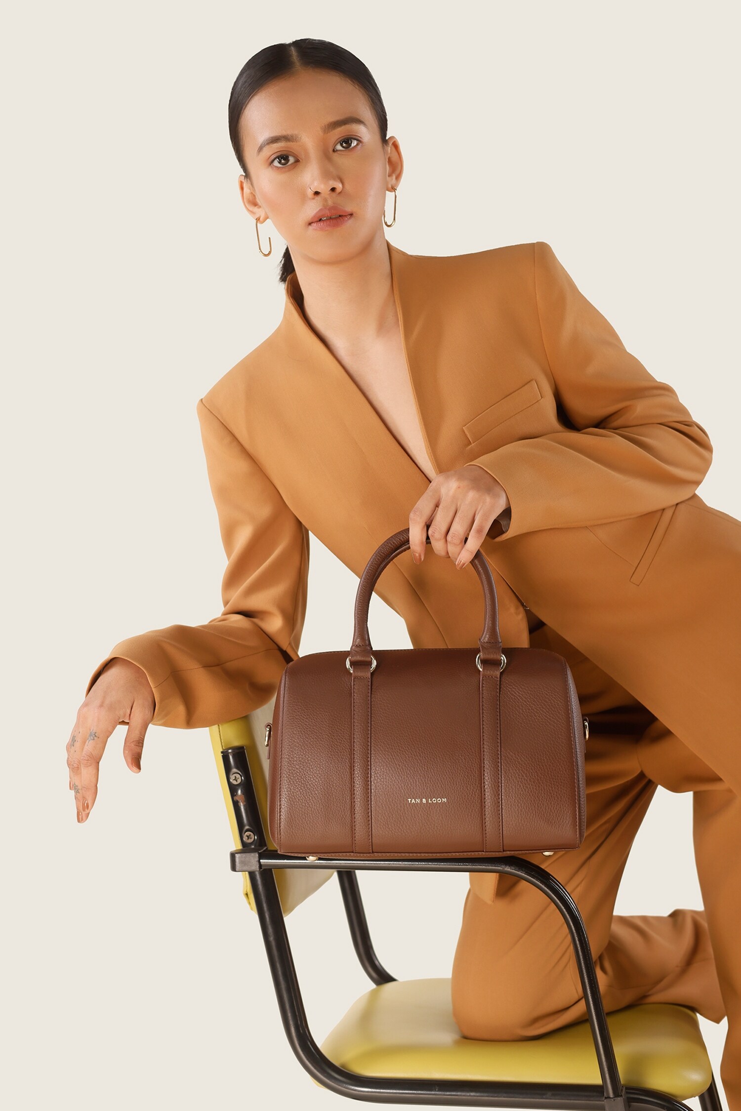 Buy Brown Textured Leather Boston Bag by Tan & Loom Online at Aza Fashions.