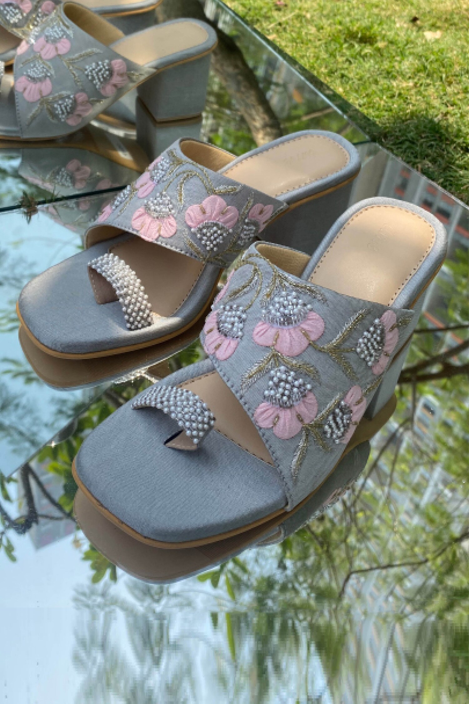 Buy Grey Embellished Floral Block Heels by Ame Online at Aza Fashions.