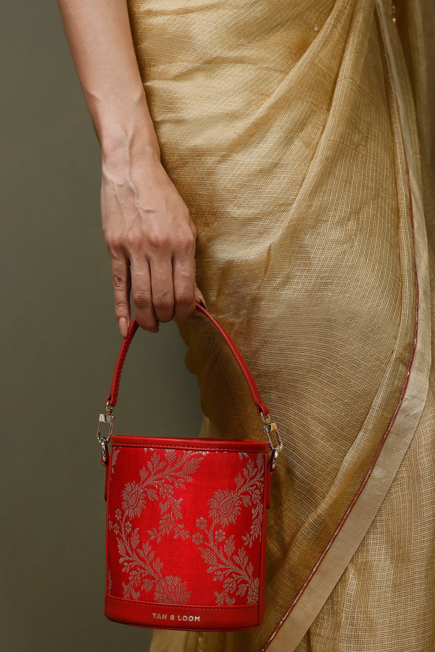 Buy Tan & Loom Floral Woven Motifs Potli Online | Aza Fashions