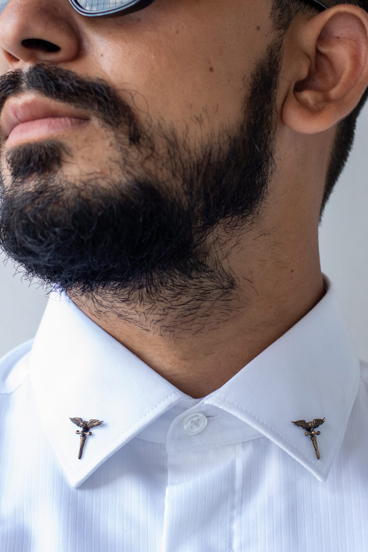 Buy Gold Roman Sword Collar Tips by Cosa Nostraa Online at Aza Fashions.