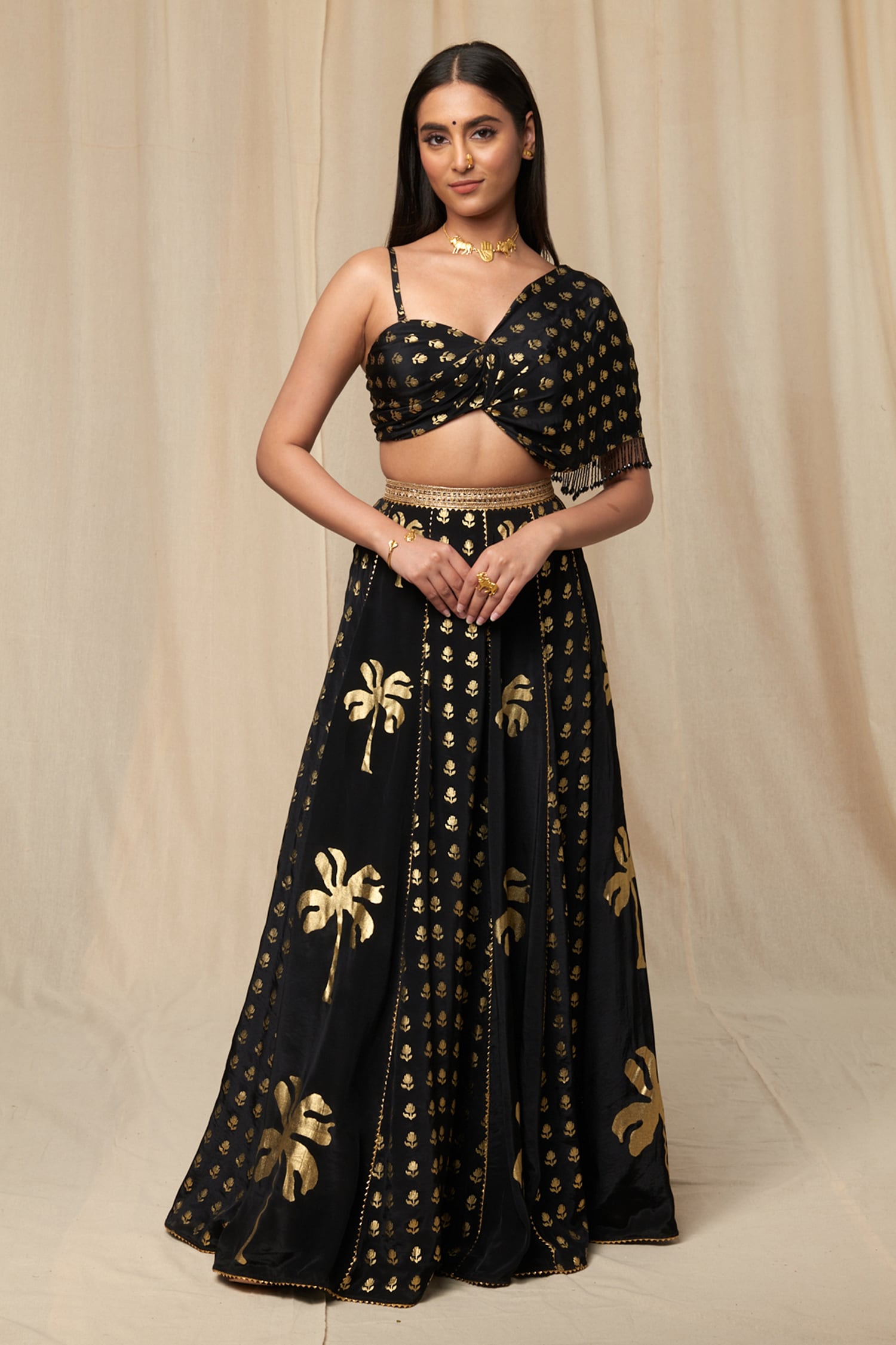 Buy Black Crepe Printed Wallflower Draped Bustier And Lehenga Set For ...