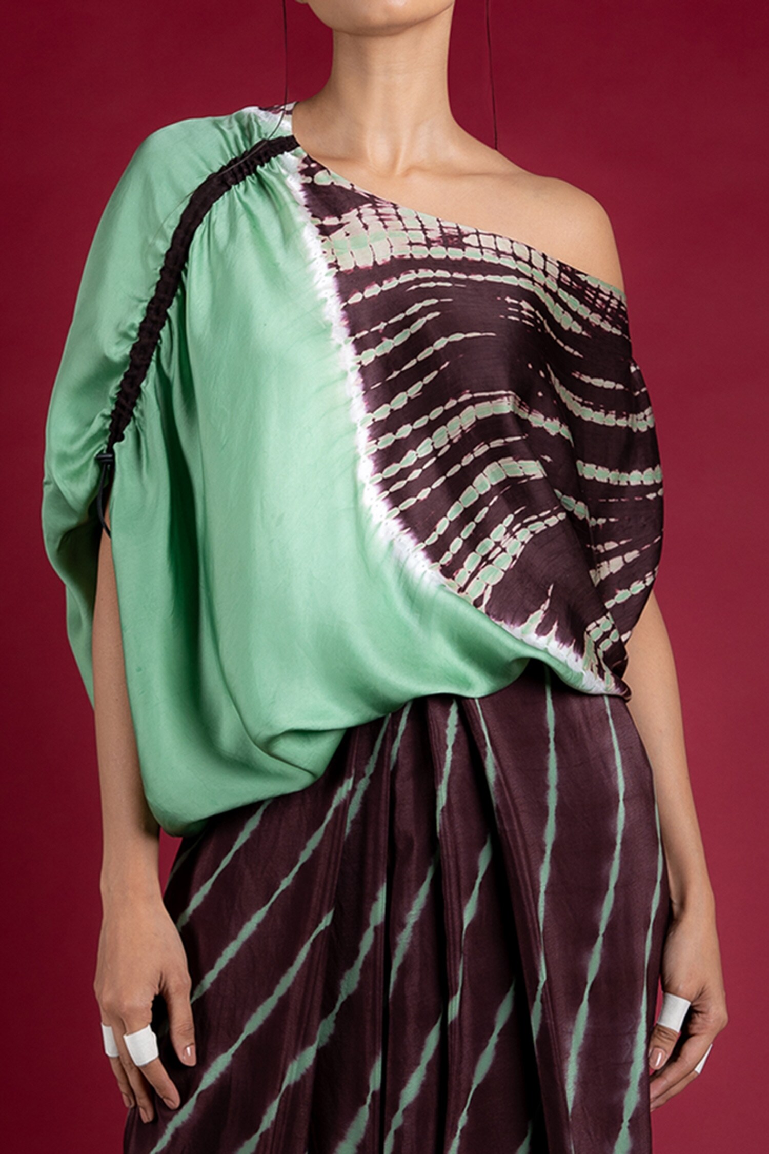Buy Nupur Kanoi Green Satin Leheriya Print Top And Lungi Set Online ...