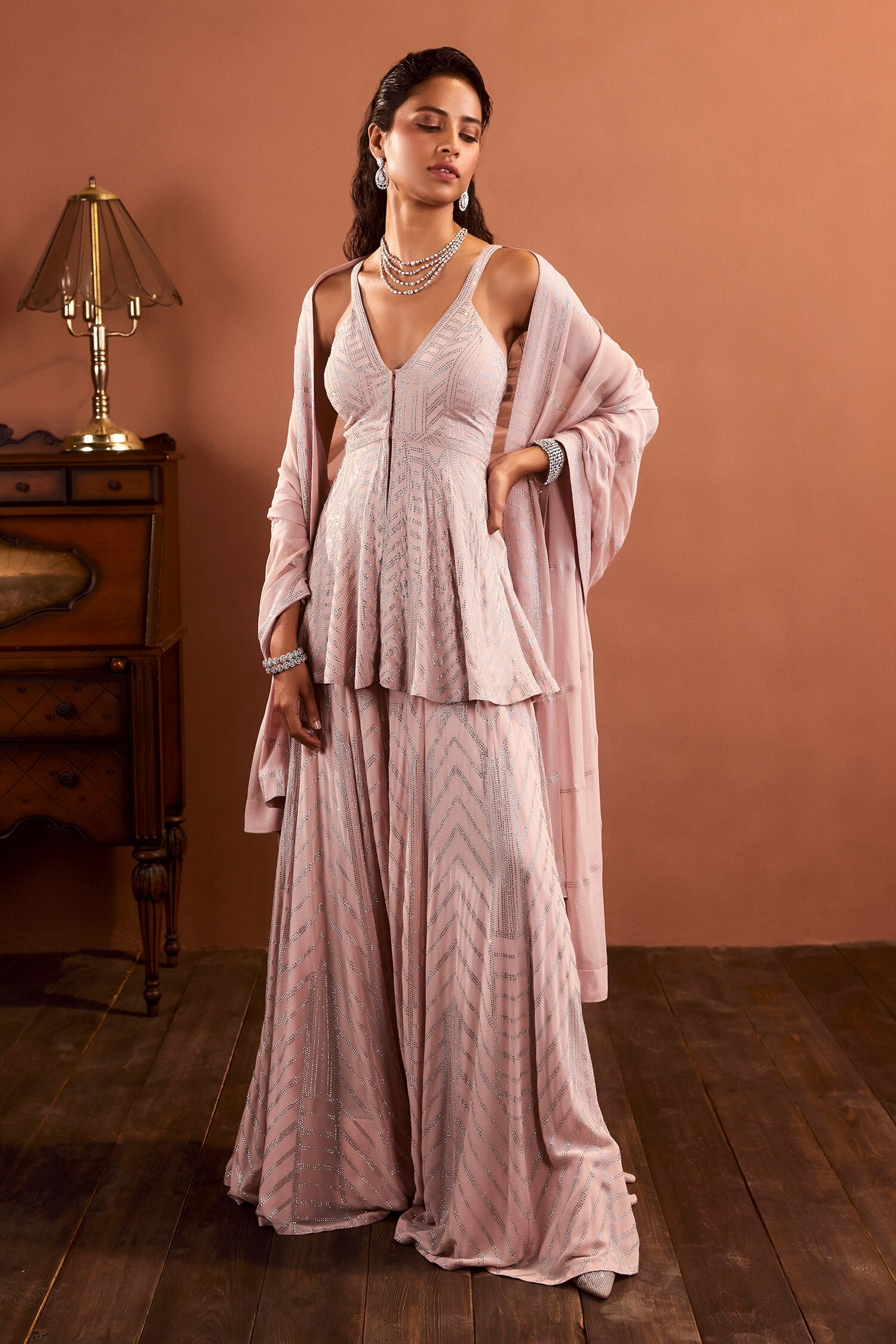 Buy Seema Gujral Pink Georgette Crystal Embellished Peplum Sharara Set ...