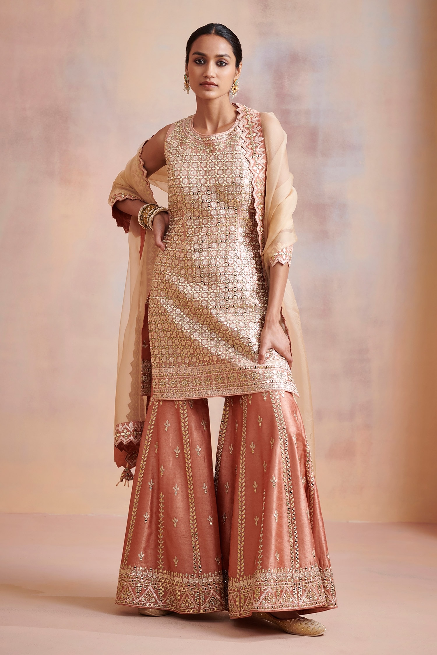 Buy Orange Tissue Embroidered Resham Work Round Mirror Gharara Set For ...