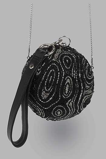 Buy Black Sequin The Cypher Ball Clutch by Ornatte Online at Aza Fashions.