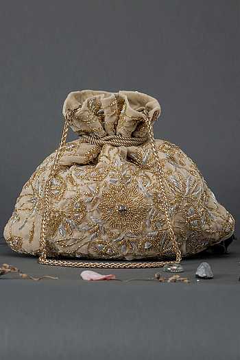Buy Gold Embellished Potli Bag by EENA Online at Aza Fashions.